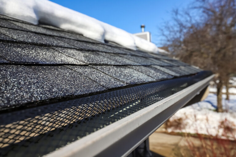 How to Avoid Ice Dams and Roof Damage in Winter - One Stop Roofing